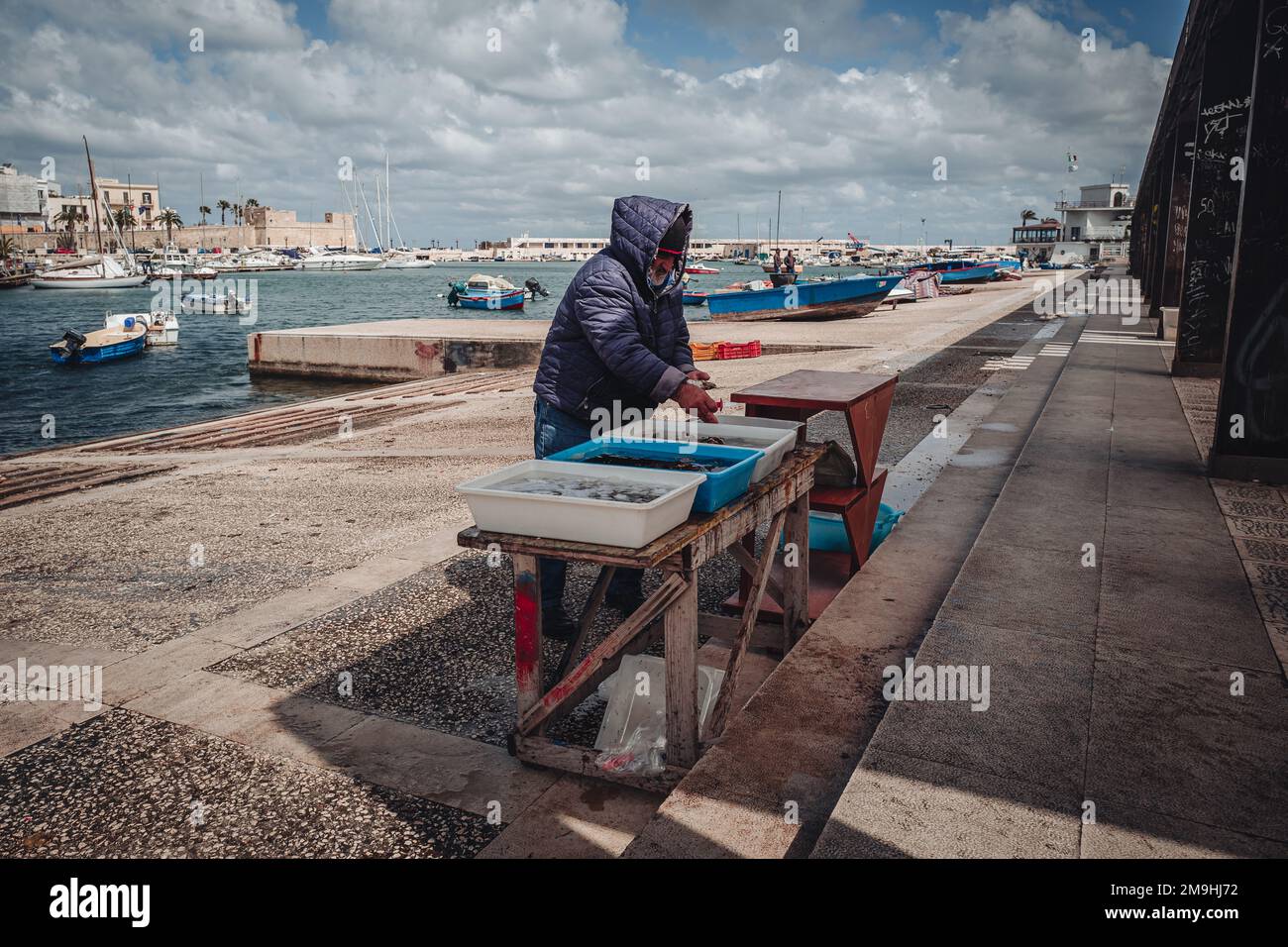 Bari, italy: authentic local scenes by the fish market Stock Photo - Alamy