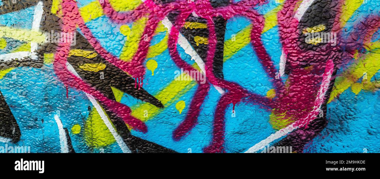 Close-up of colorful graffiti on wall Stock Photo - Alamy