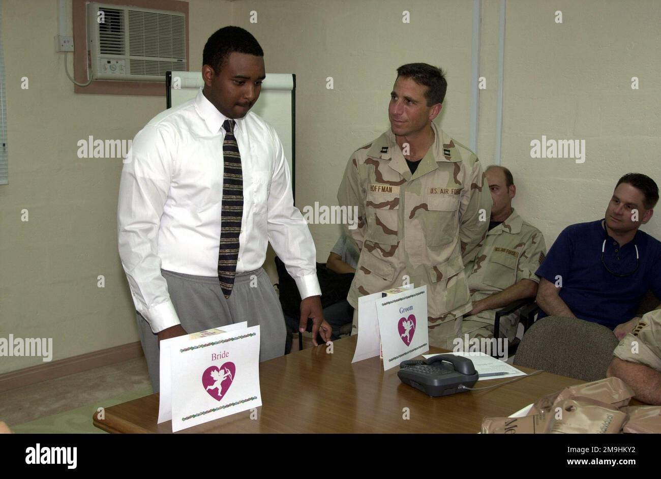 Standing as a witness to the moment, Captain (CAPT) Martin Hoffman, the ...