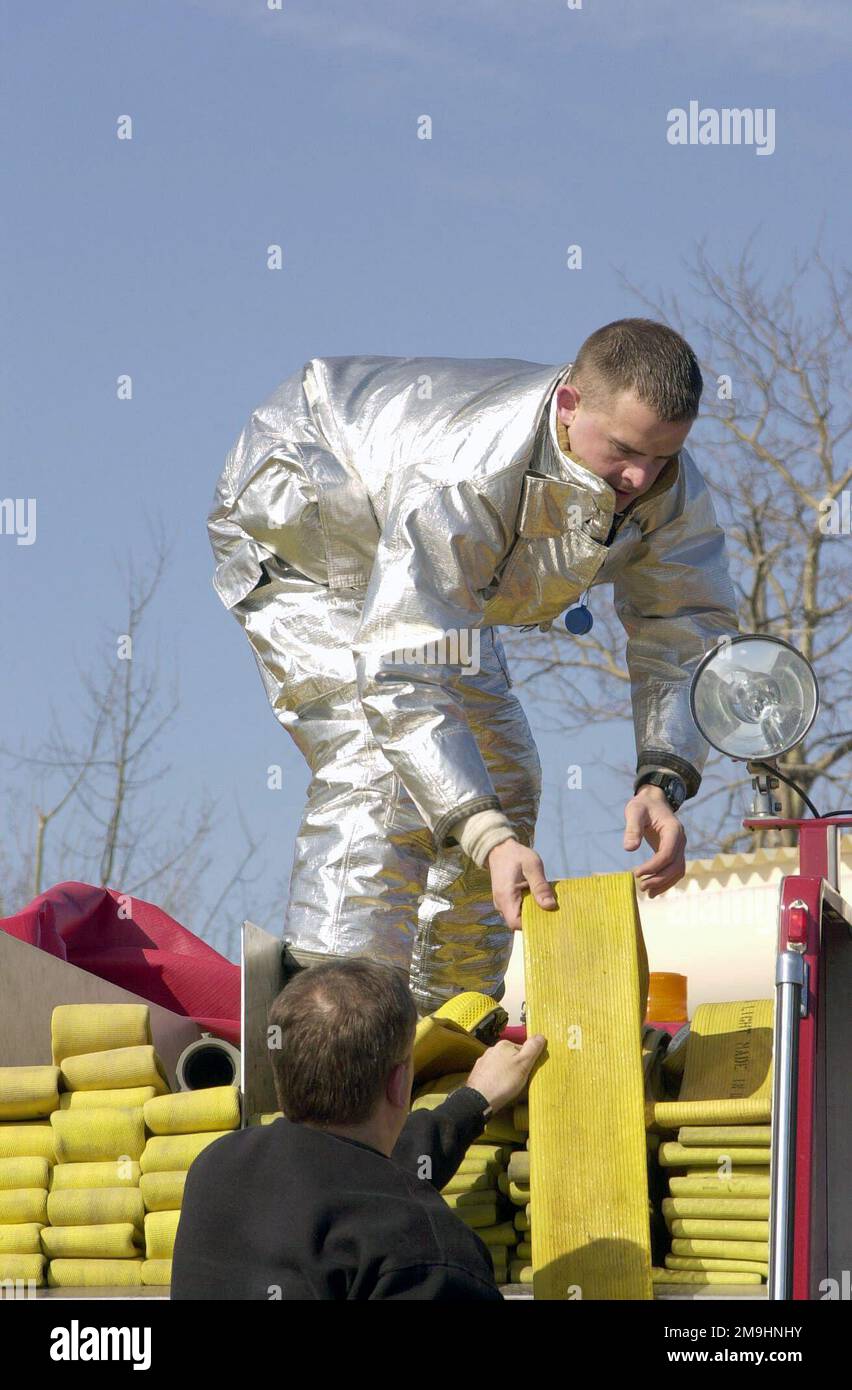 Firefighters, in full proximity suit, 148th Fighter Wing (FW), 148th ...