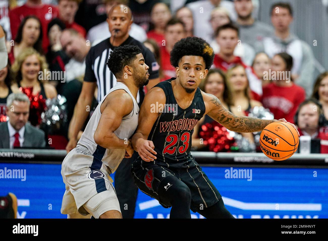 Wisconsin's Chucky Hepburn (23) and Penn State's Camren Wynter (11 ...