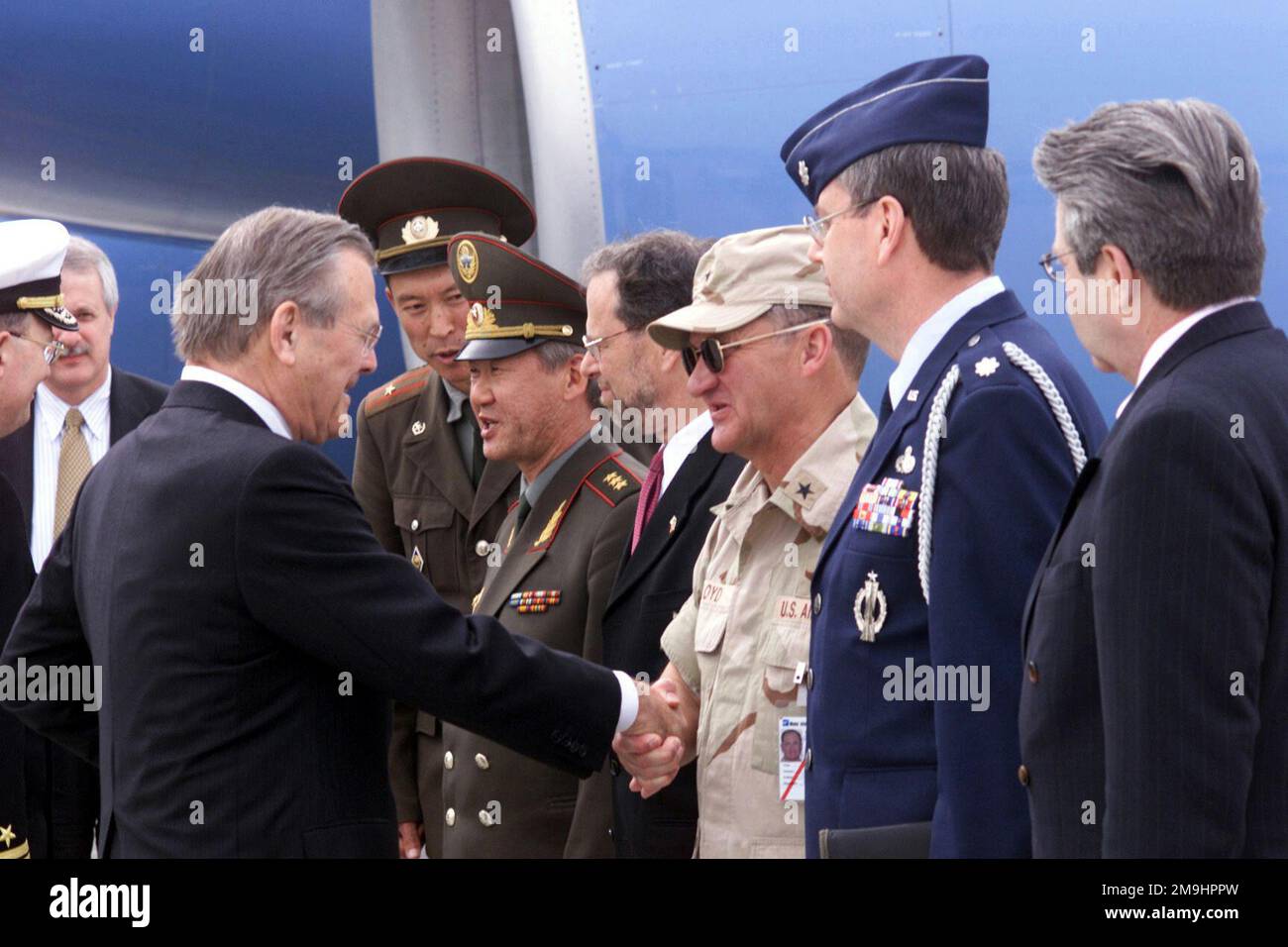 The Honorable Donald H. Rumsfeld, U.S. Secretary of Defense shakes ...