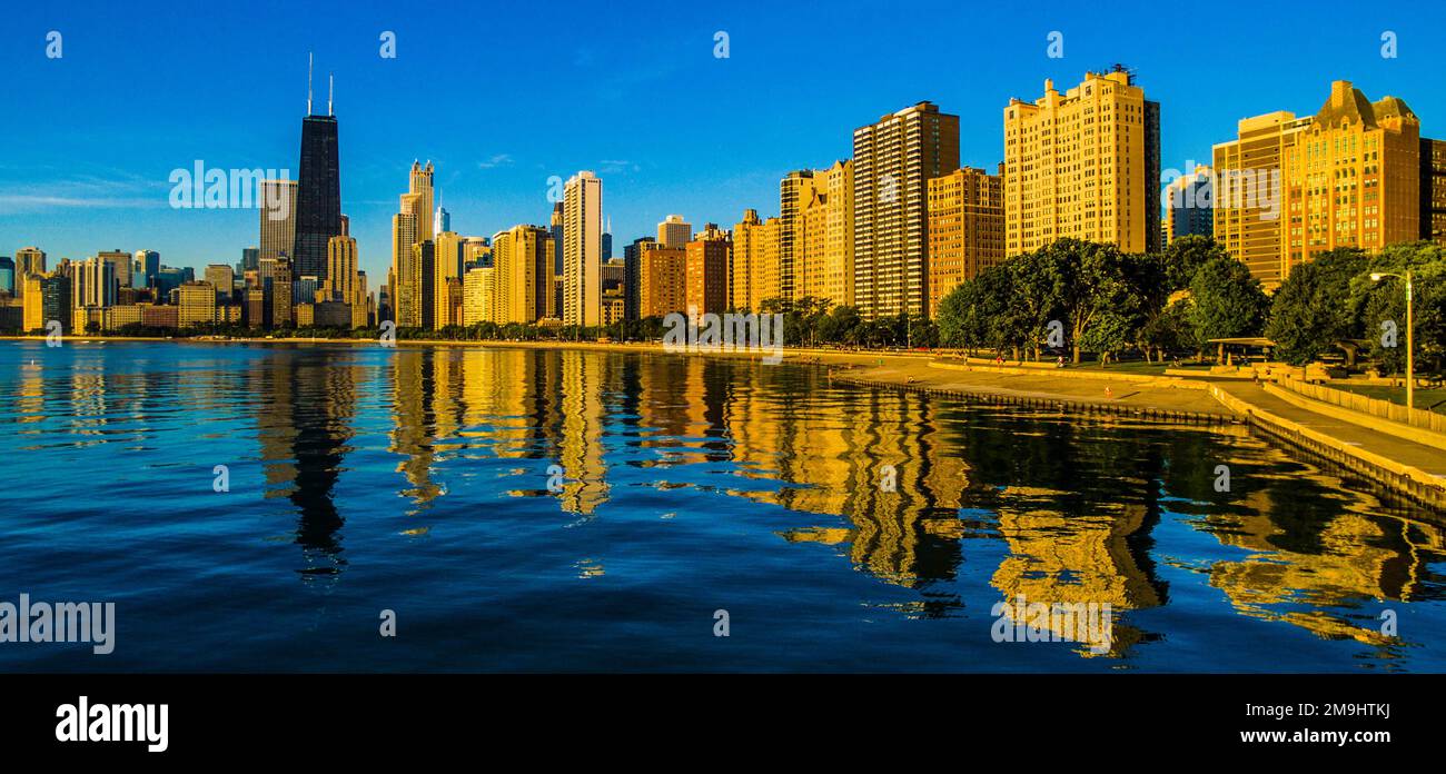Skyscrapers reflecting in water in Chicagos Gold Coast, Chicago, Illinois, USA Stock Photo - Alamy