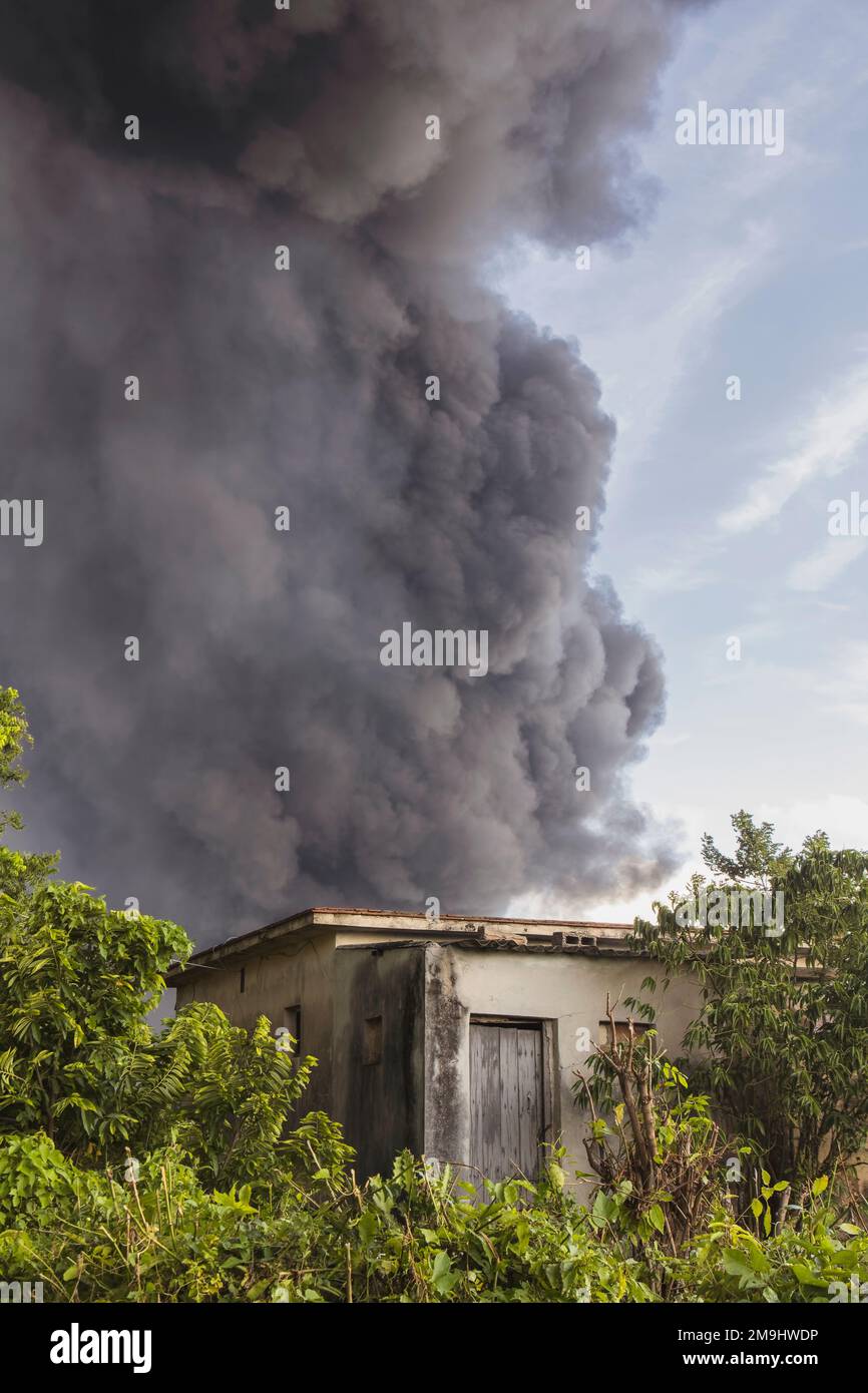A view of the smoke curtain after the explosion of fuel tanks in ...