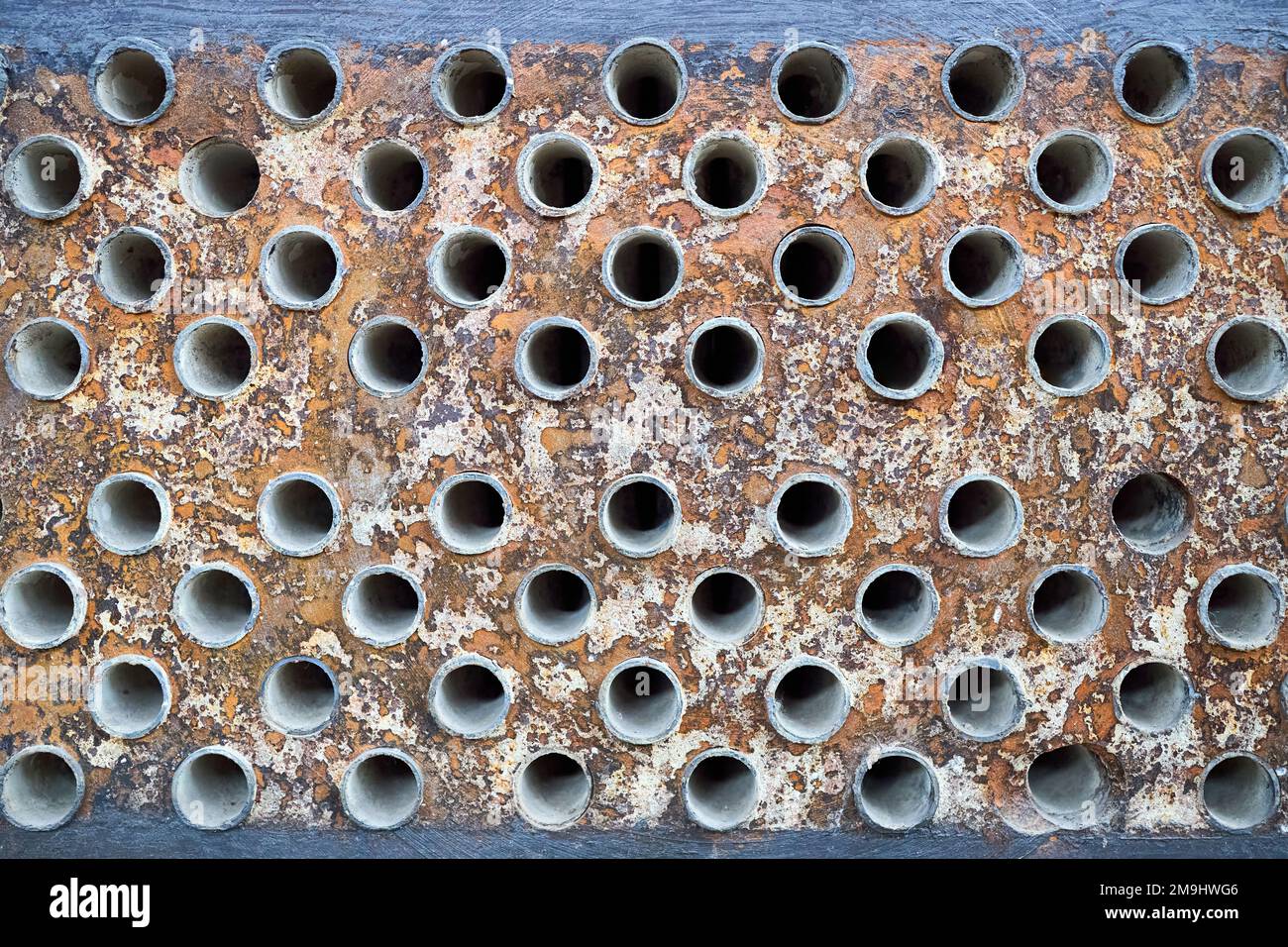 Tube sheet plate of heat exchanger or boiler closeup texture macro ...