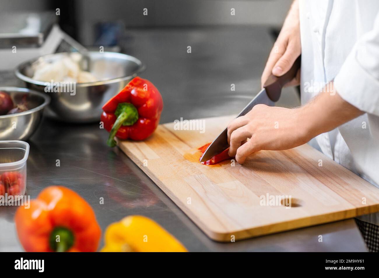 Chef cooking food on kitchen hi-res stock photography and images - Alamy