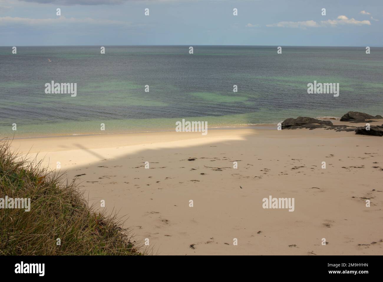 sunset shadows in a lonely beach in the Cantabrian sea Stock Photo - Alamy