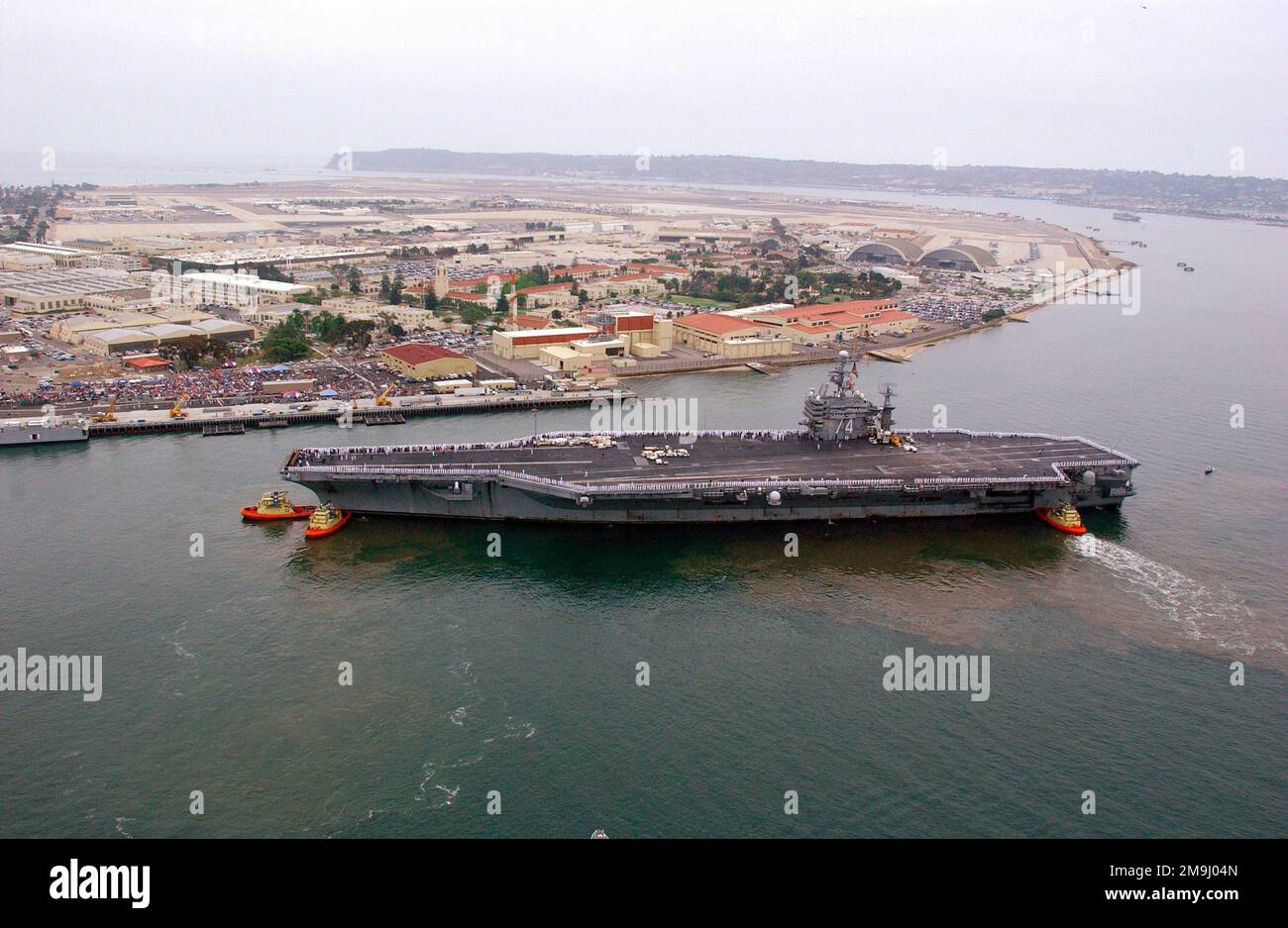 Aerial port side view of the NIMITZ class Aircraft Carrier USS JOHN C ...