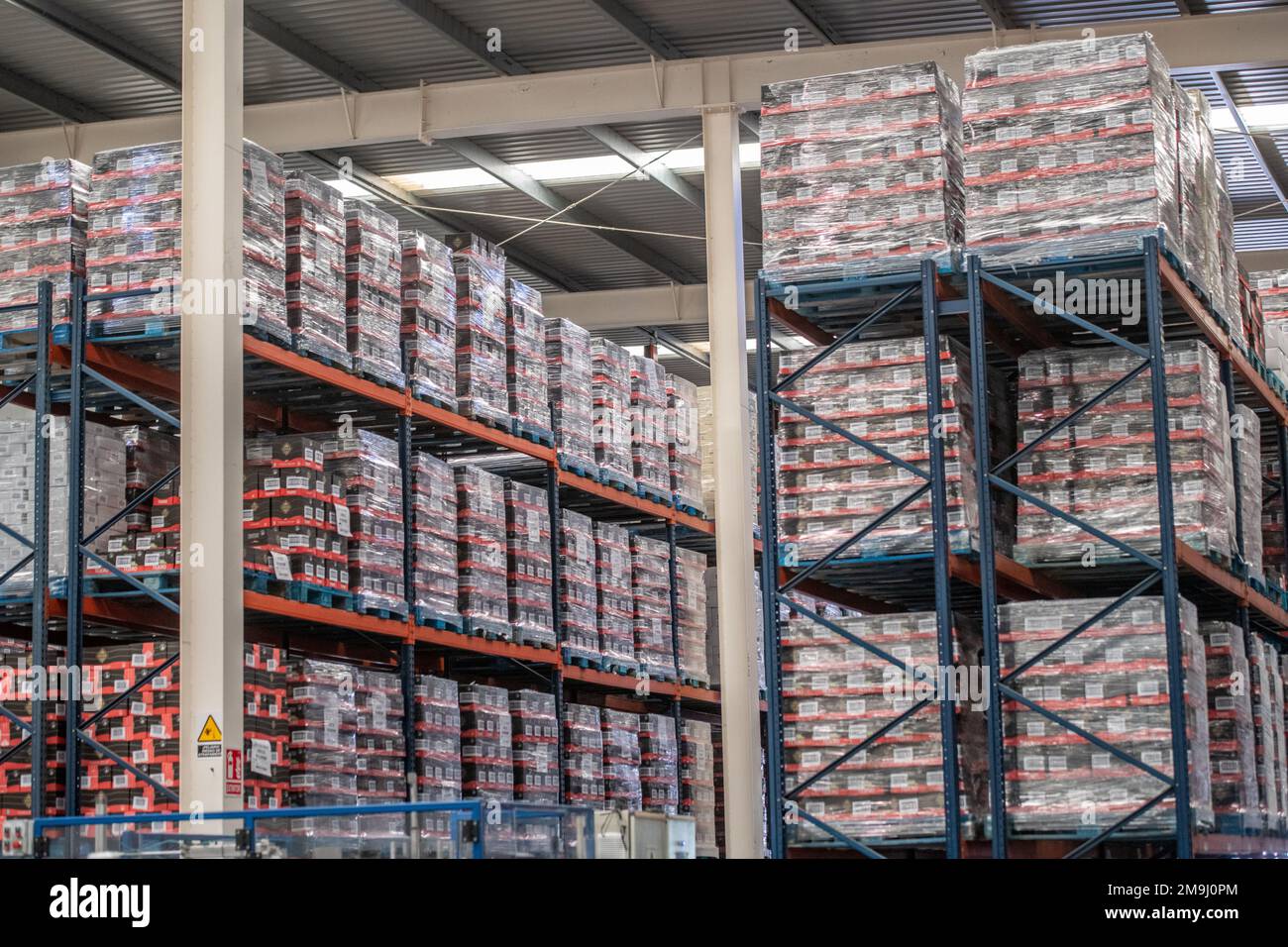 Warehouse shelves full of products, Fish canning factory (USISA), Isla ...