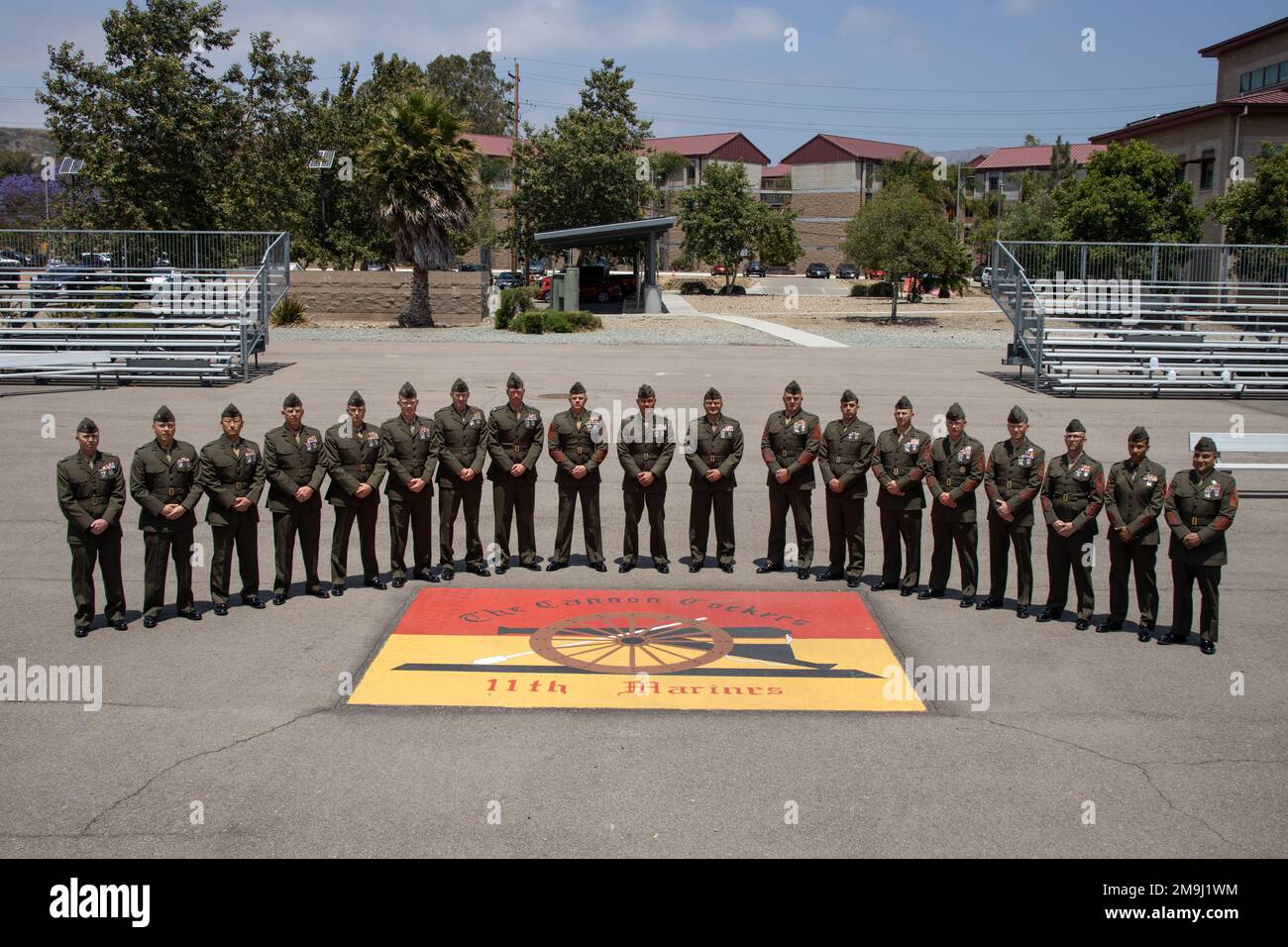 U.S. Marines with 11th Marine Regiment, 1st Marine Division, pose for a ...