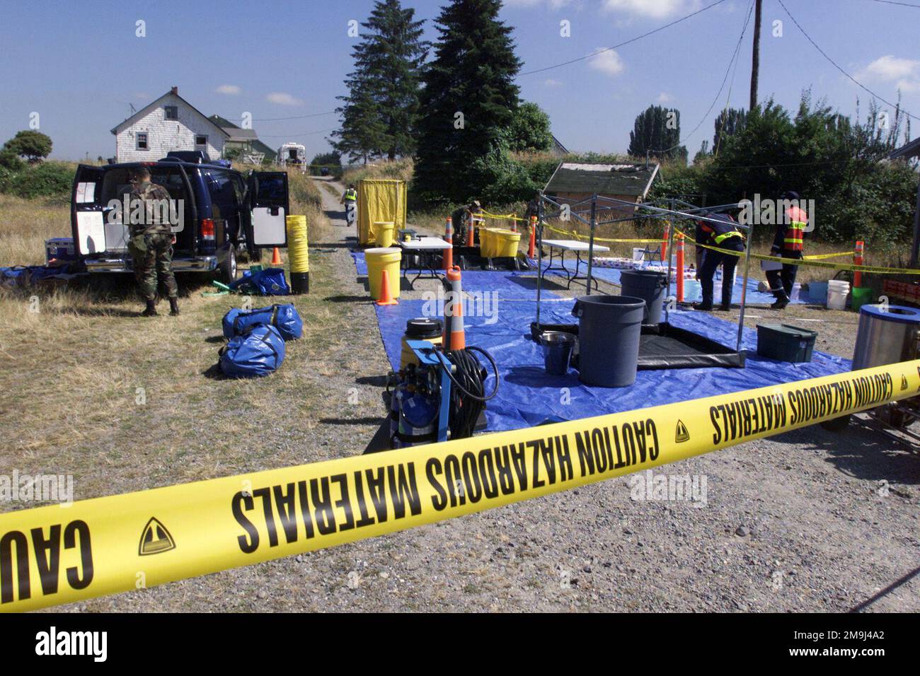 020715-F-5735S-031. [Complete] Scene Caption: Military and Civilian ...