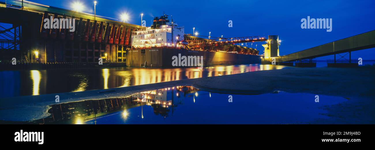Ore boats in Ore Dock at evening, Upper Harbor, Marquette, Michigan ...