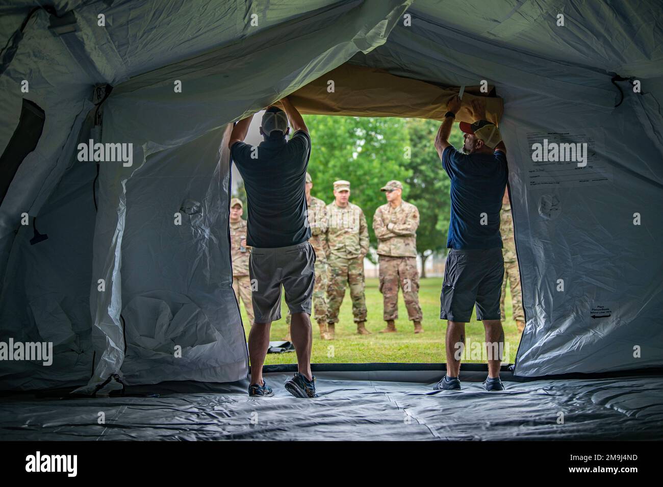 Local tent system vendors demonstrate the capabilities of a tent ...