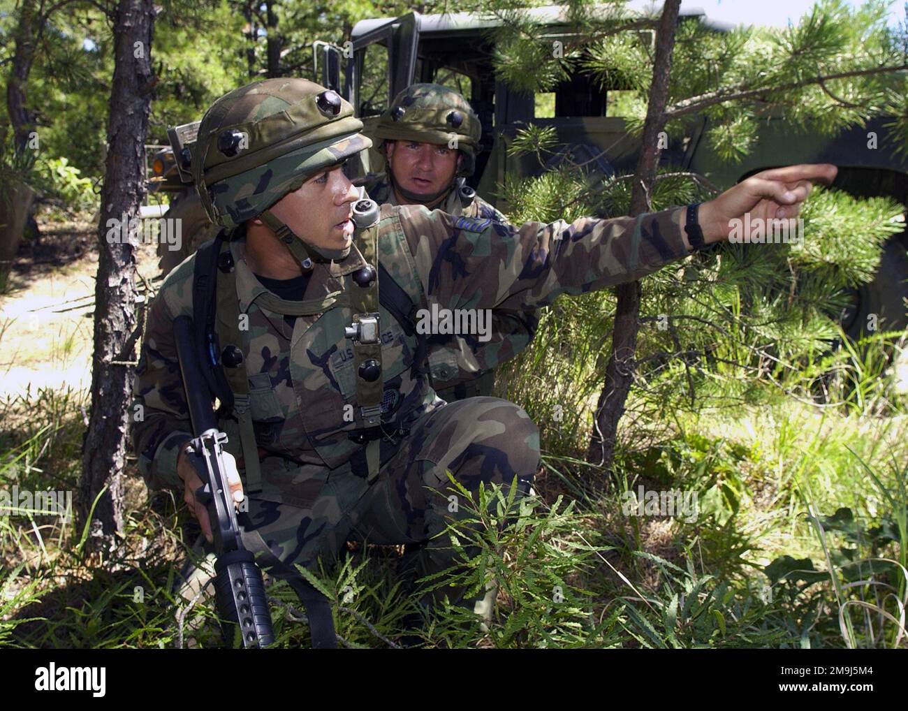 US Air Force (USAF) STAFF Sergeant (SSGT) Peter Gardea (foreground ...