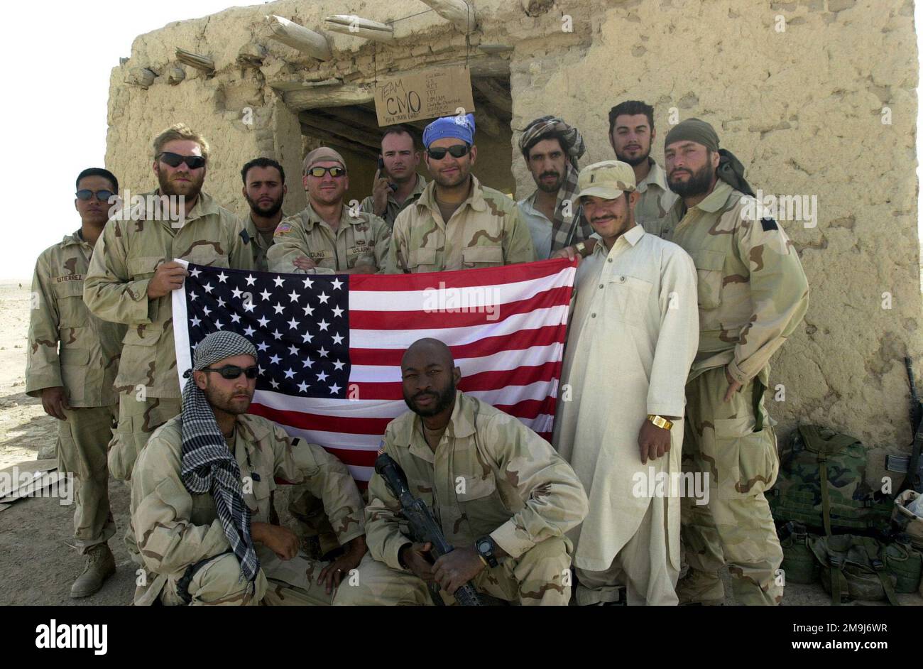 020823-A-6042E-001. [Complete] Scene Caption: US Military and Civilian ...