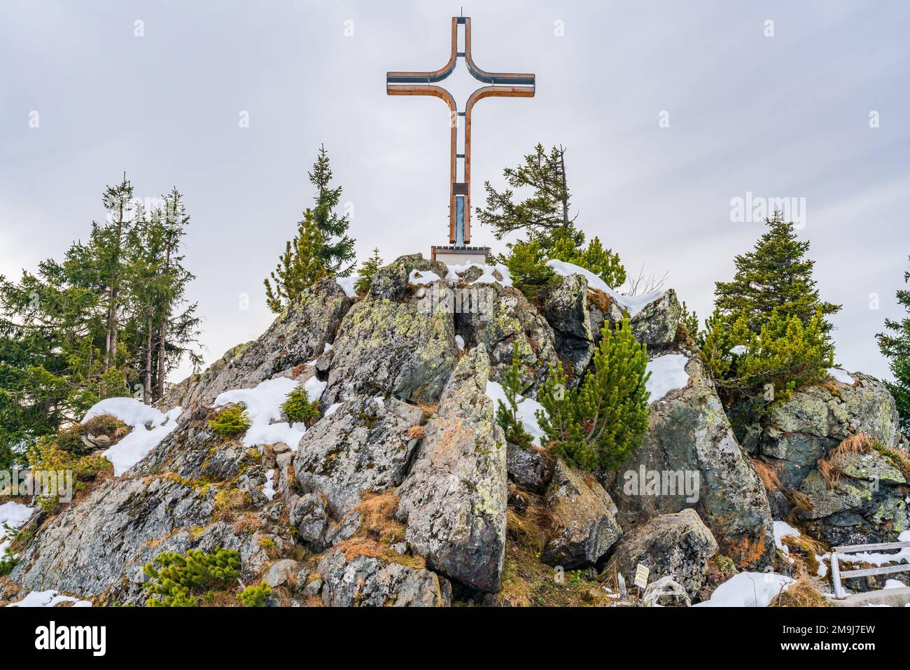 A cross on top of Hahnenkamm mountain in Kitzbuhel, Austria Stock Photo ...
