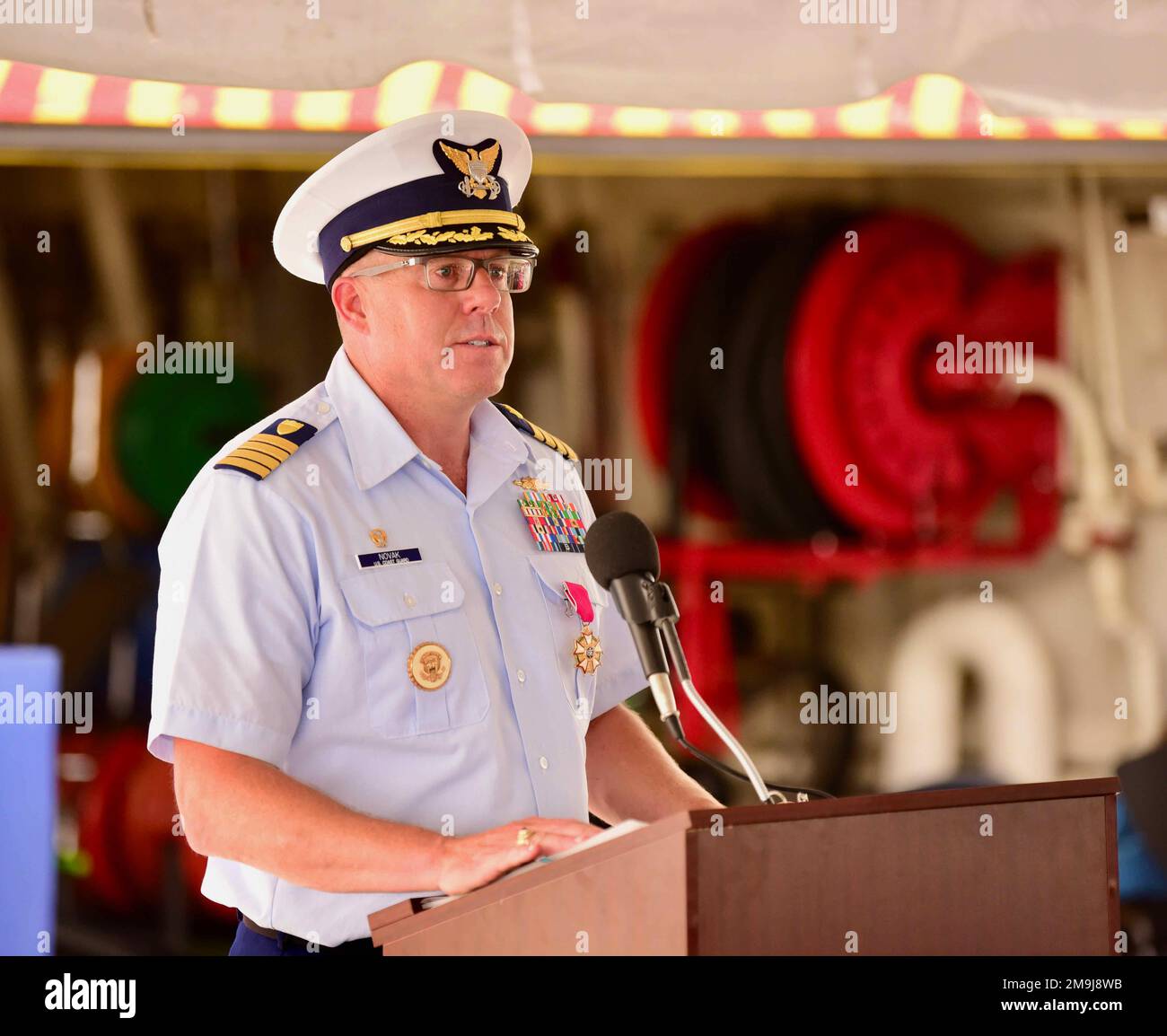 U.S. Coast Guard Capt. Blake Novak gives a speech during the change-of ...