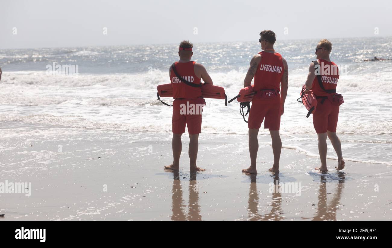 U.S. Marines with Onslow Beach Marine Detachment watch the beach during ...