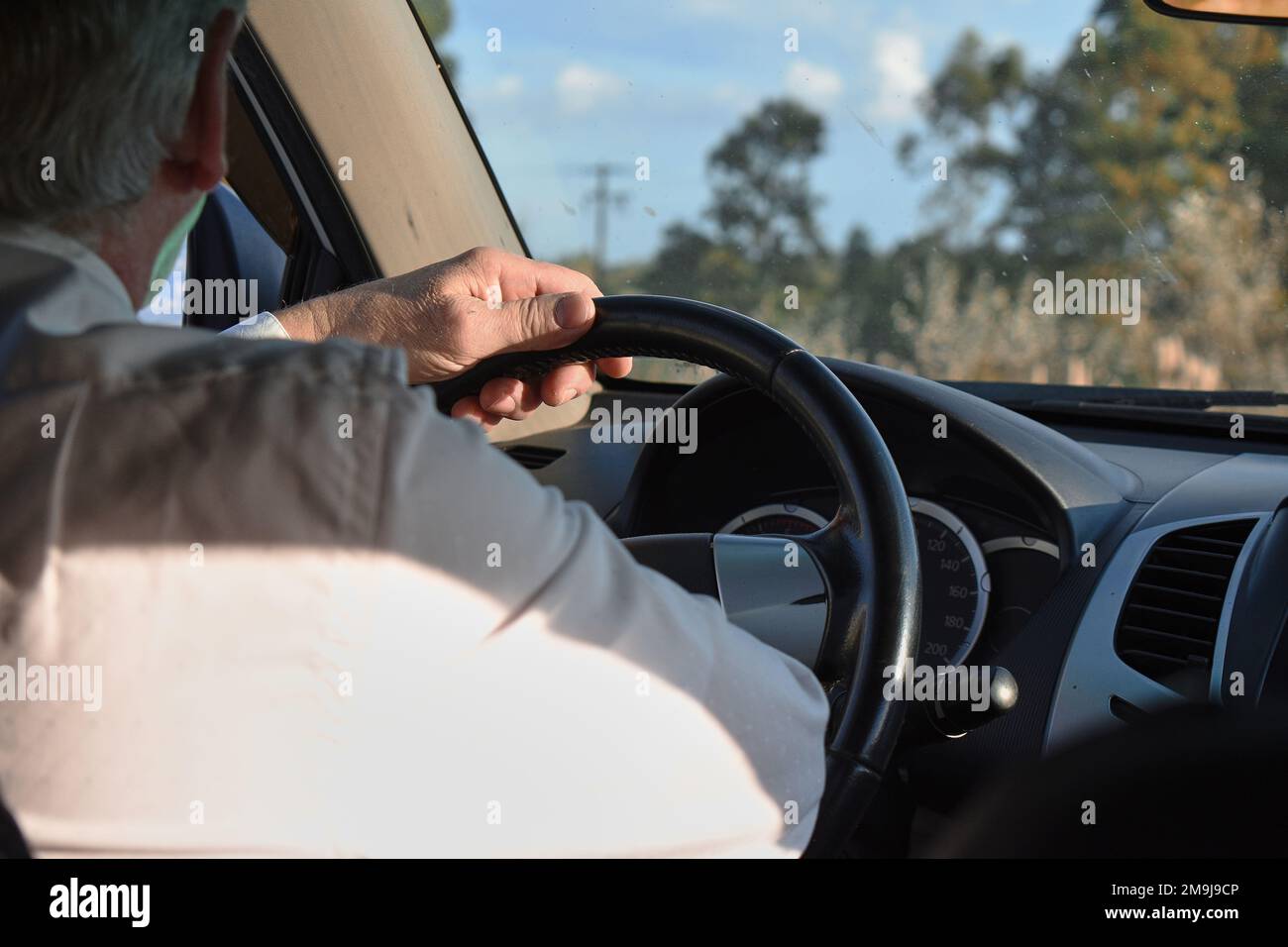 hands of an old man driving a truck on vacation trip Stock Photo - Alamy