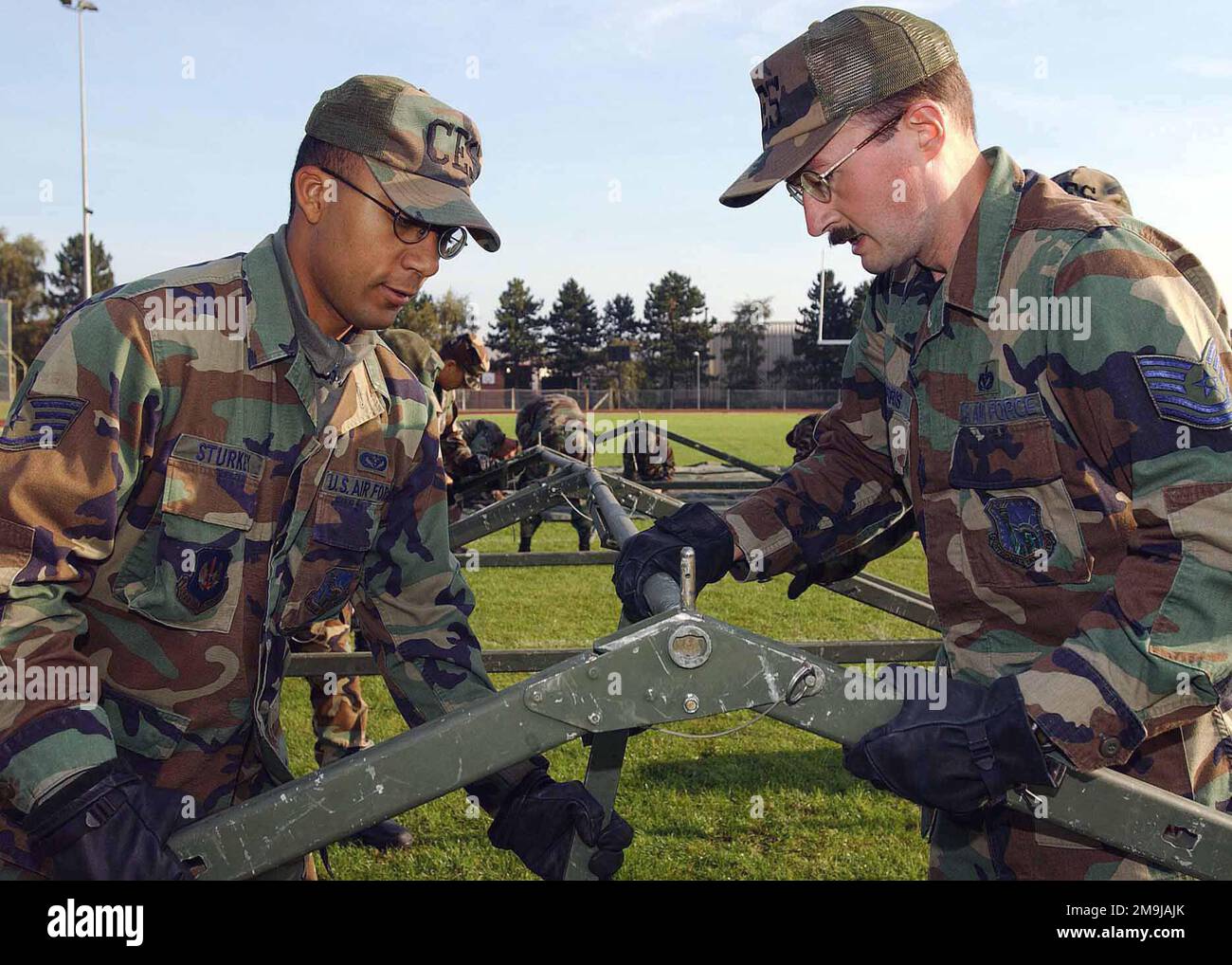 US Air Force (USAF) STAFF Sergeant (SSGT) Donald Sturkey (left) and ...