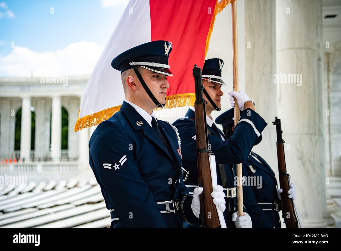 An Air Force color guard holds the Indonesian flag in the Memorial ...