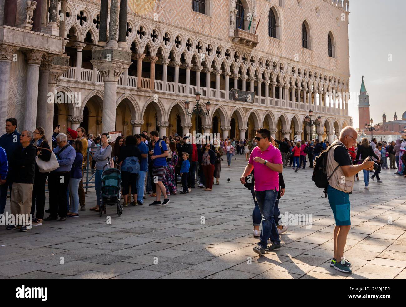 Tourists queue to enter the Basilico San Marco in Venice, Italy Stock ...