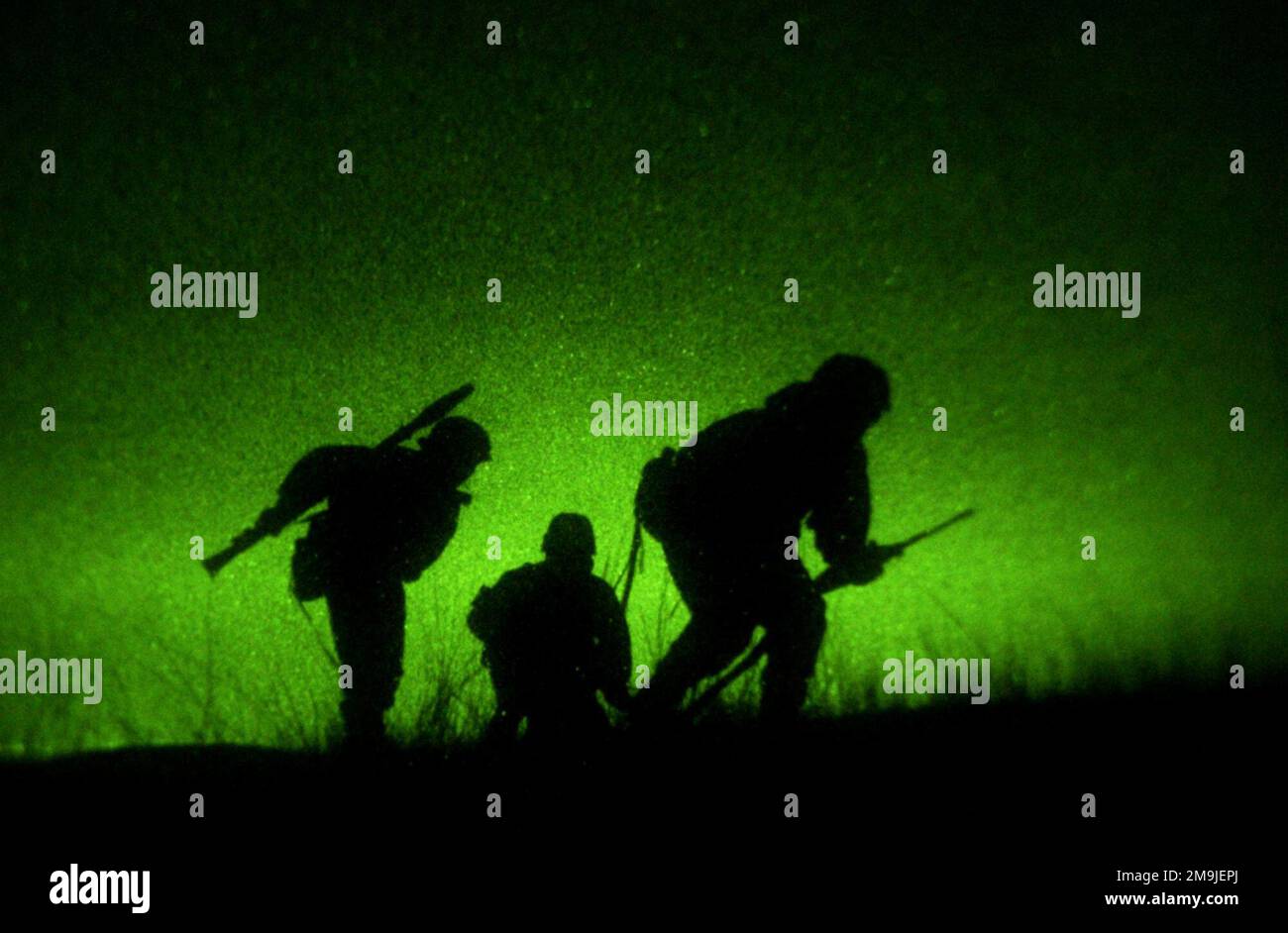 021127-F-6701P-008. [Complete] Scene Caption: Night vision photo of ...