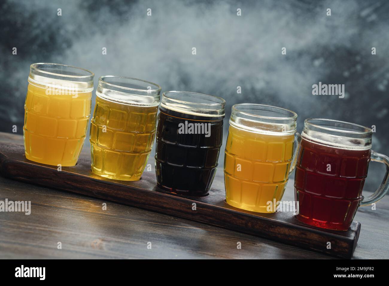 Assorted beer set ready for tasting, angled view Stock Photo - Alamy