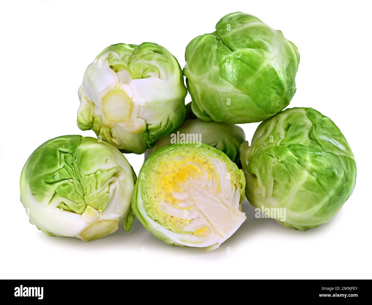 fresh green brussels sprouts isolated on white background, close up of ...