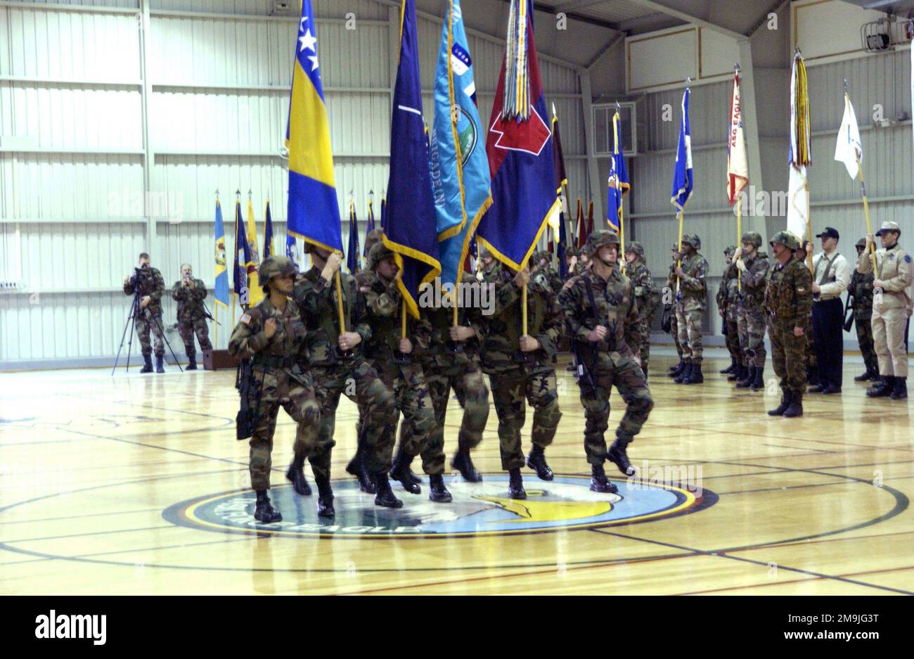 The Color Guard of the Multinational Division is marches into a ...