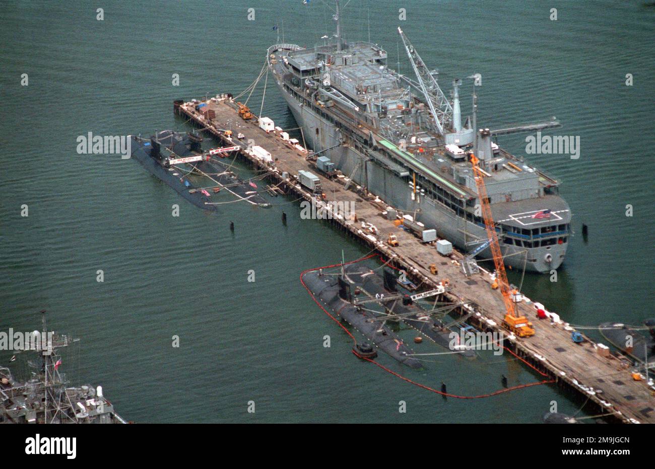 An aerial view of a section of the Naval Station showing destroyer and ...