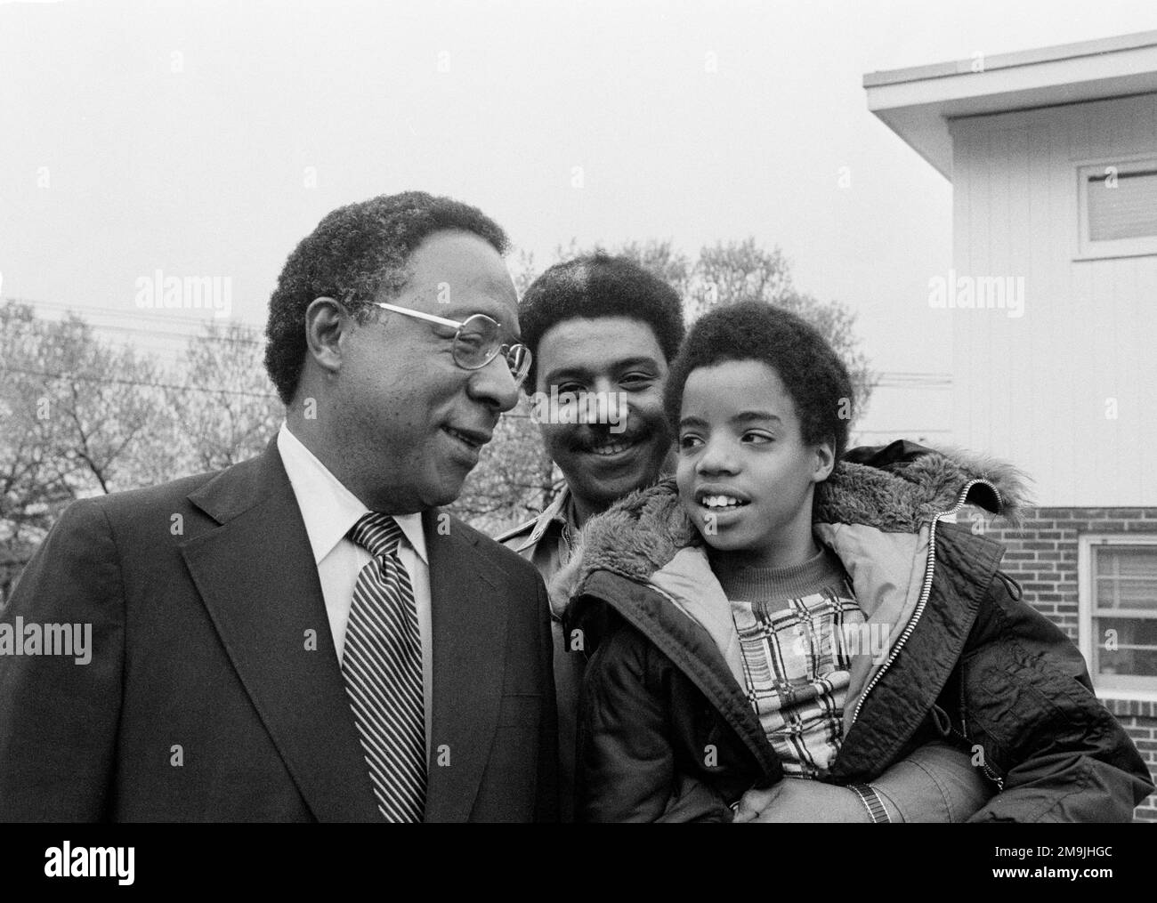 "Roots" author Alex Haley, left, poses with his son William, center ...