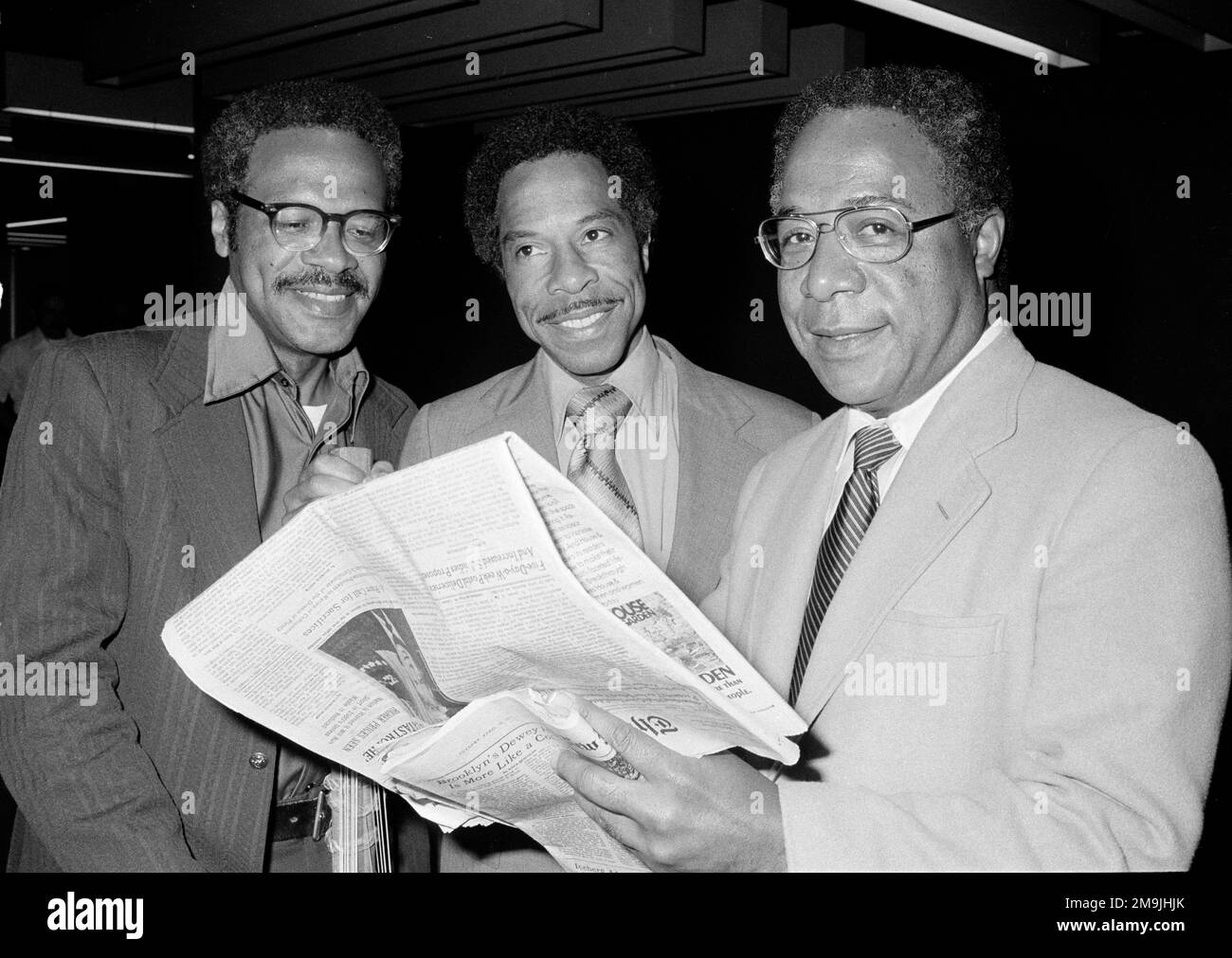 Author Alex Haley, right, poses with his brothers Julius, left, and ...