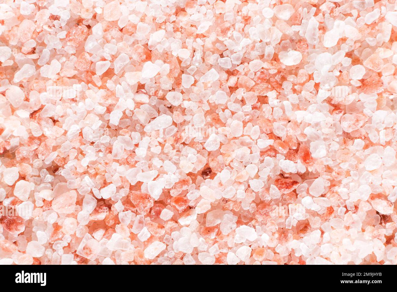 Himalayan salt texture and background for design. Close up of pink salt ...