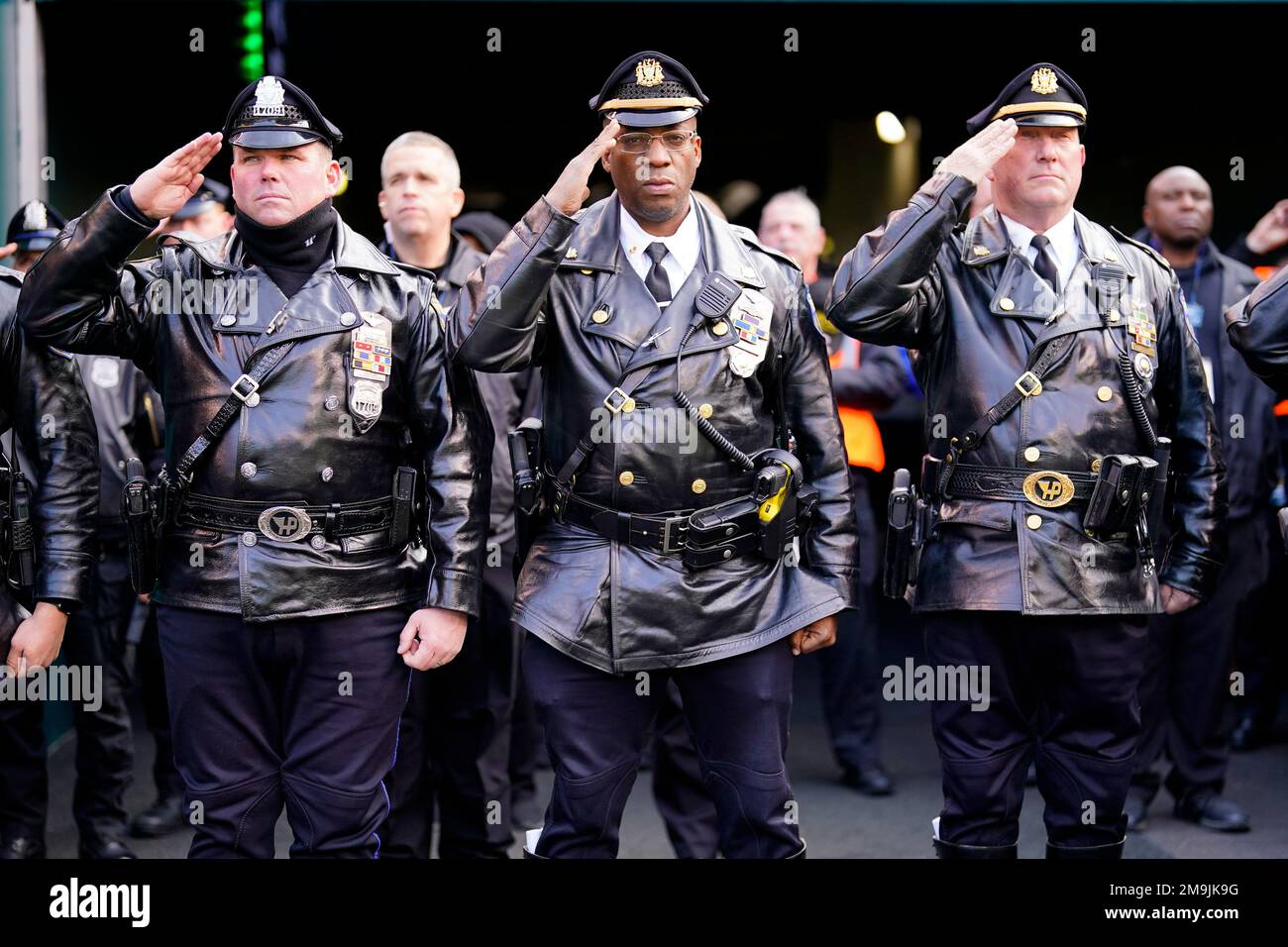 Philadelphia Police Officers salute during the nathaniel anthem before ...