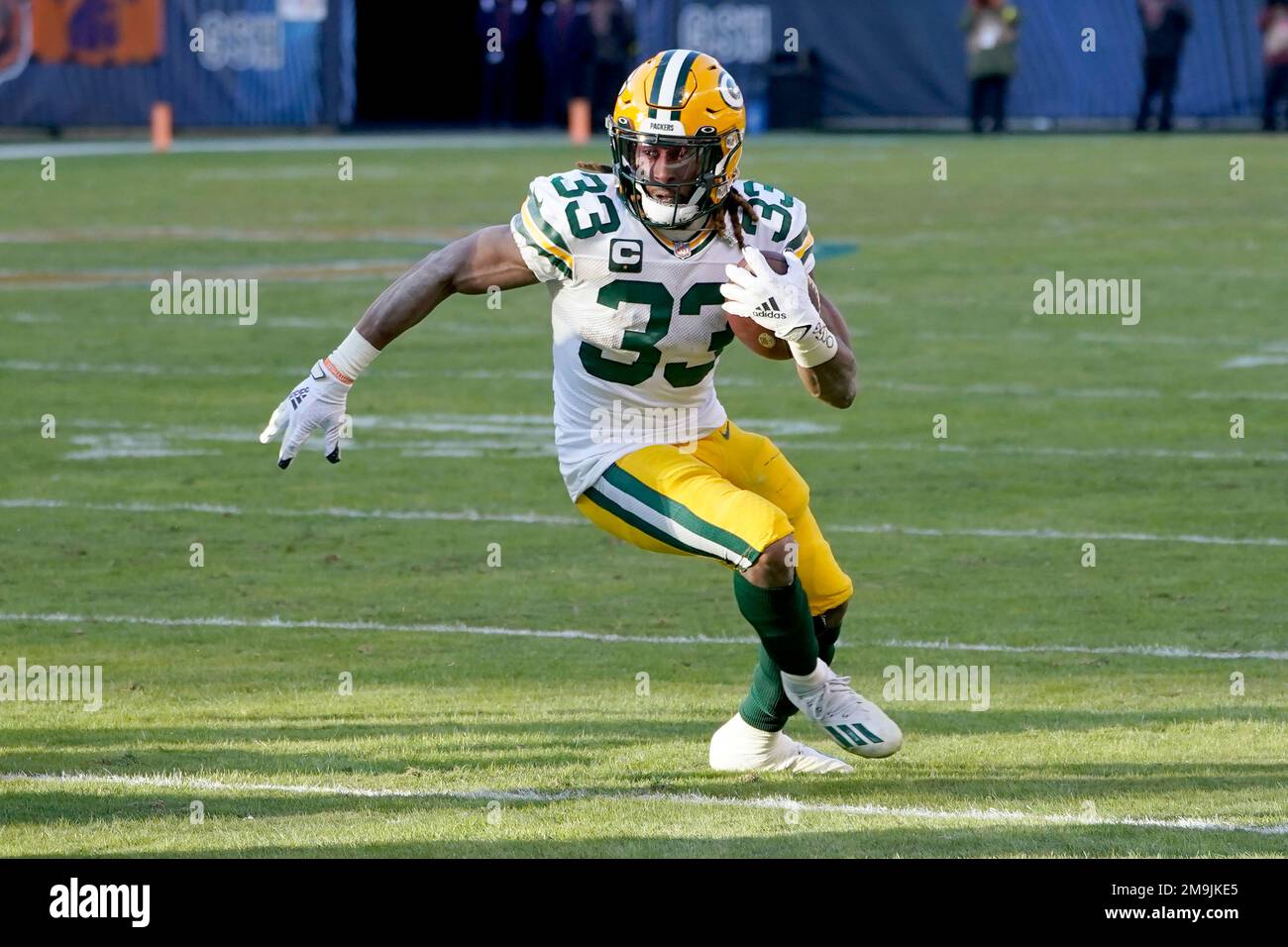 Green Bay Packers running back Aaron Jones carries the ball during an ...