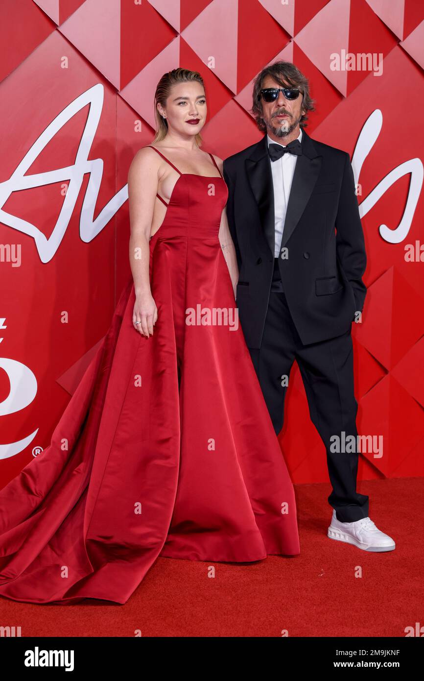 Florence Pugh, left, and Pier Paolo Piccioli pose for photographers ...