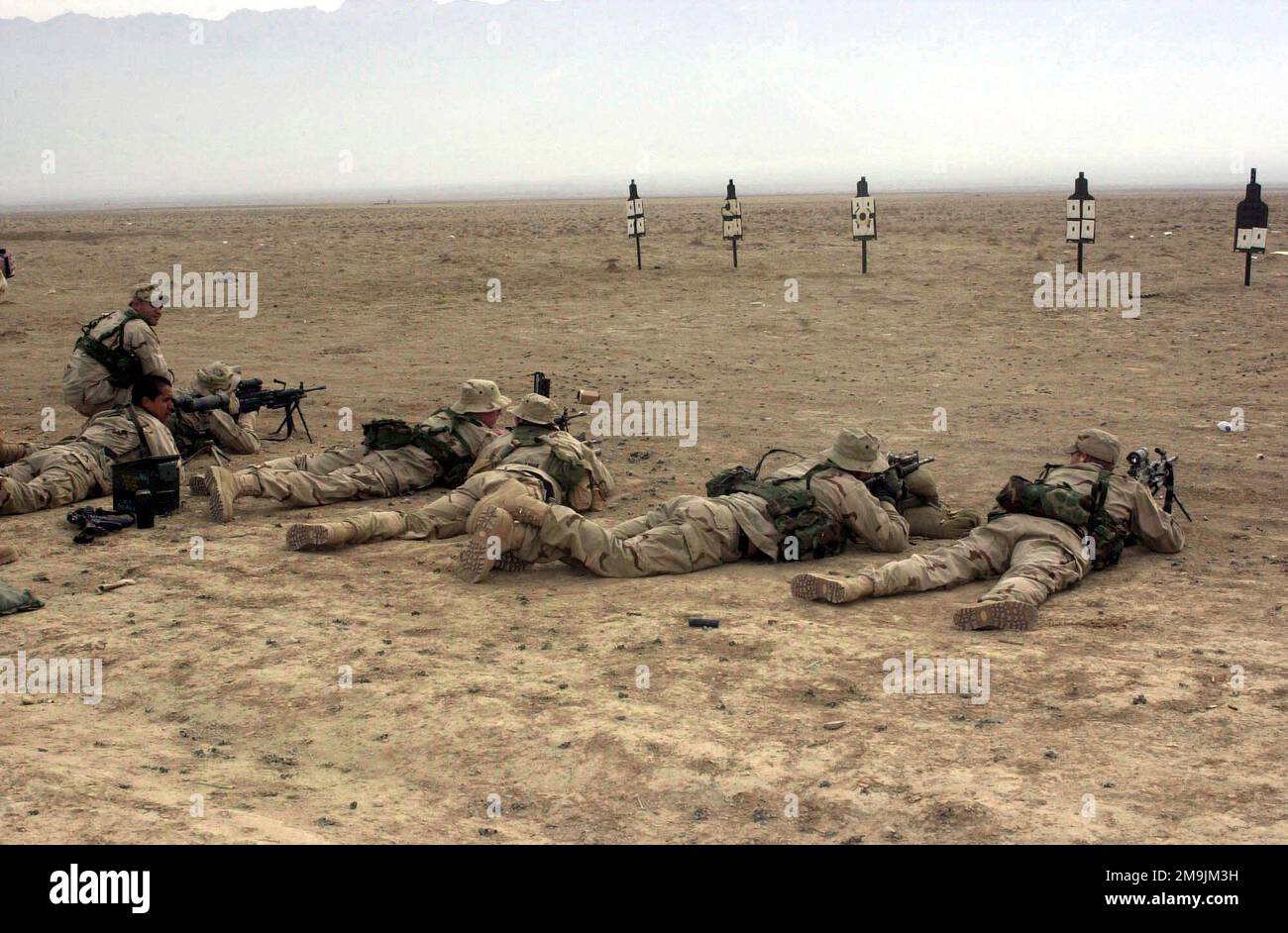 At a live fire range near Bagram Airfield, members with the 82nd ...