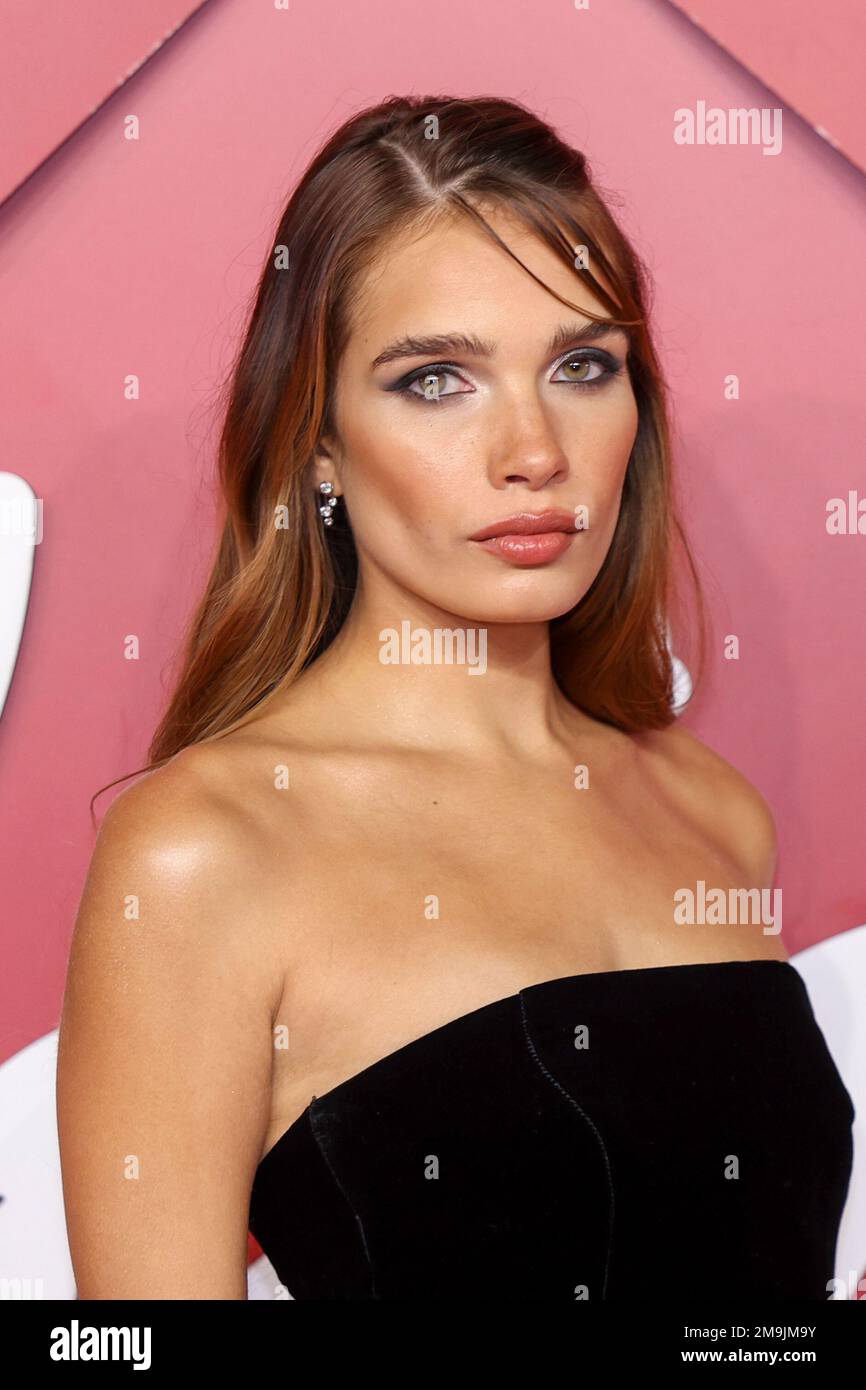 Hana Cross poses for photographers upon arrival at the British Fashion ...