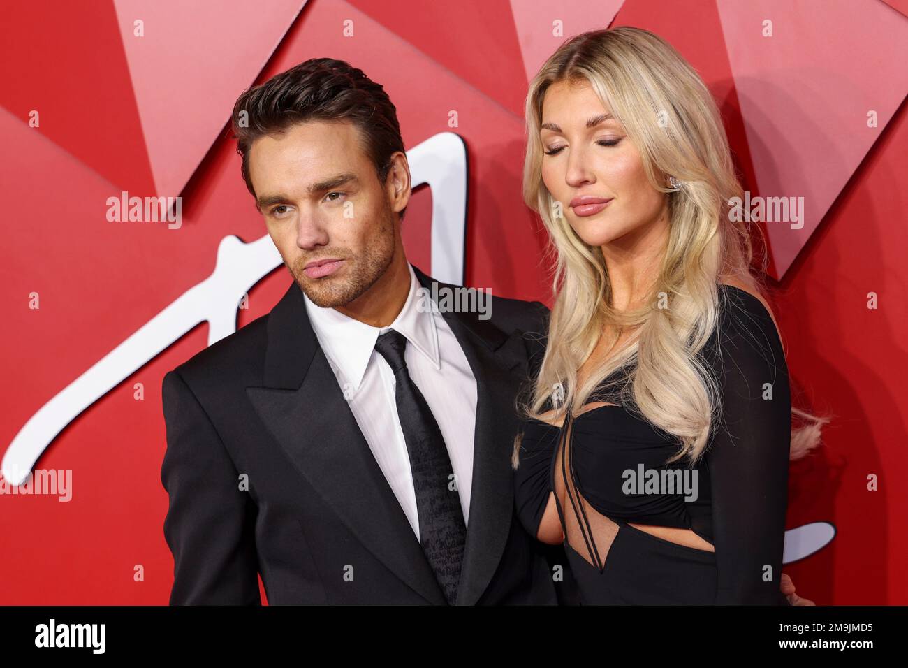 Liam Payne, left, and Kate Cassidy pose for photographers upon arrival ...