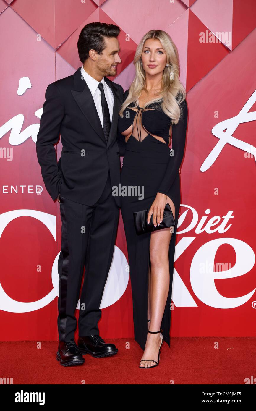 Liam Payne, left, and Kate Cassidy pose for photographers upon arrival ...