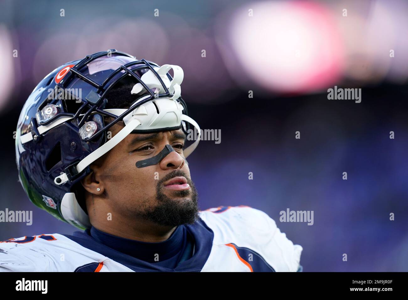 Denver Broncos defensive end Dre'Mont Jones stands on the sideline in ...