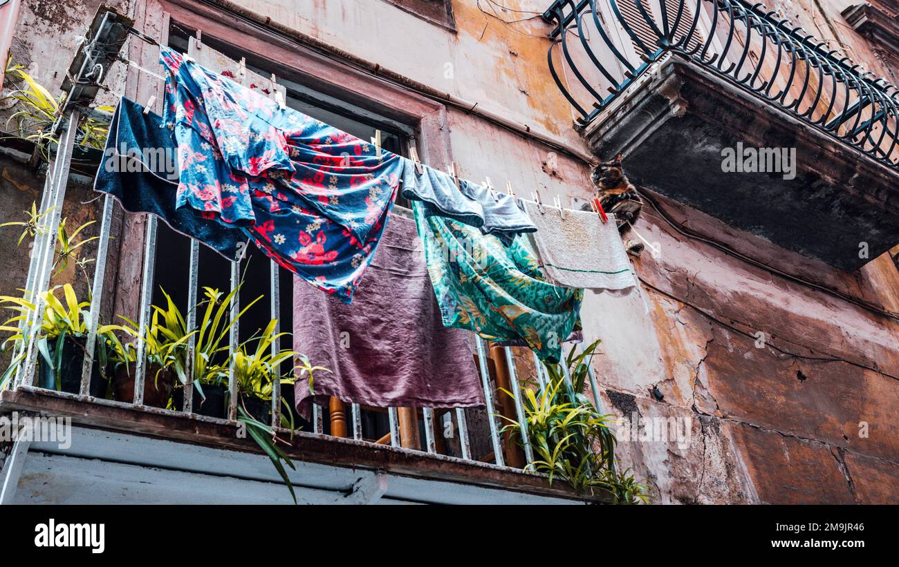 Hanging from a balcony hi-res stock photography and images - Alamy