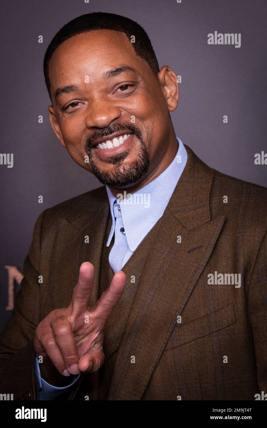 Will Smith poses for photographers upon arrival for the premiere of the ...