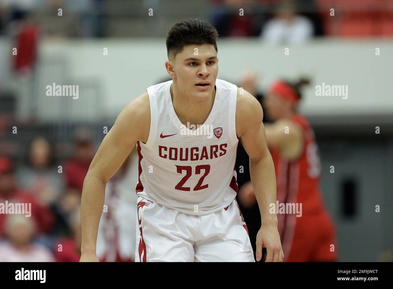 Washington State guard Dylan Darling defends during the first half of ...