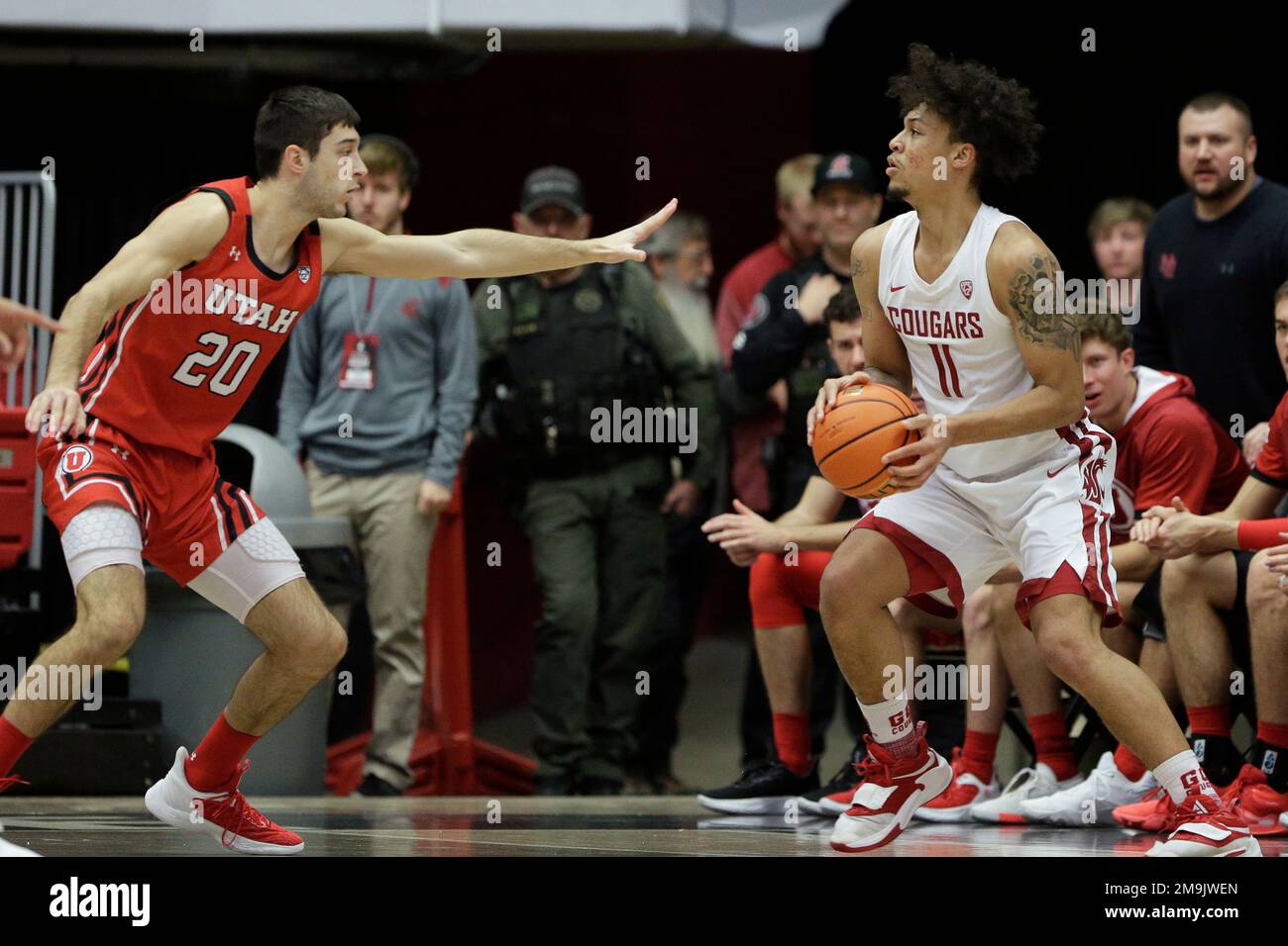 Washington State forward DJ Rodman (11) controls the ball while ...