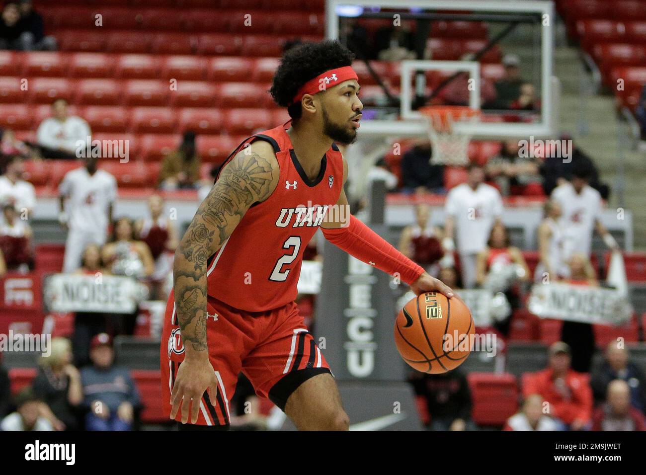 Utah guard Mike Saunders Jr. controls the ball during the first half of ...