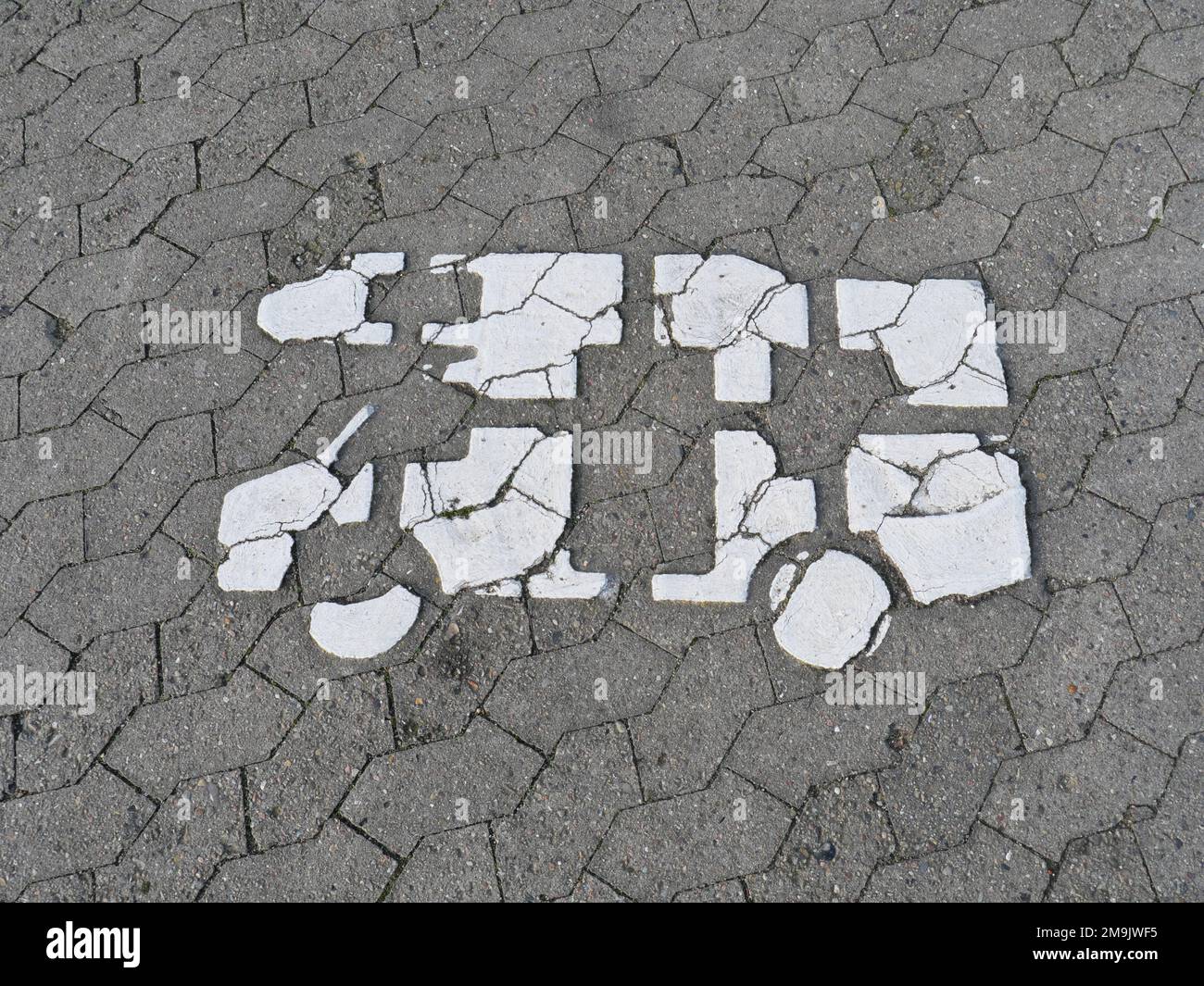 Mobile home symbol painted on paving stones to mark a mobile home ...