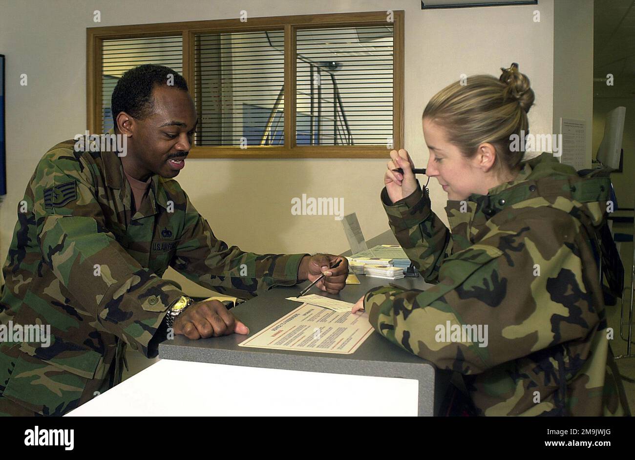 US Air Force (USAF) STAFF Sergeant (SSGT) Craig McKnight (left), 727th ...