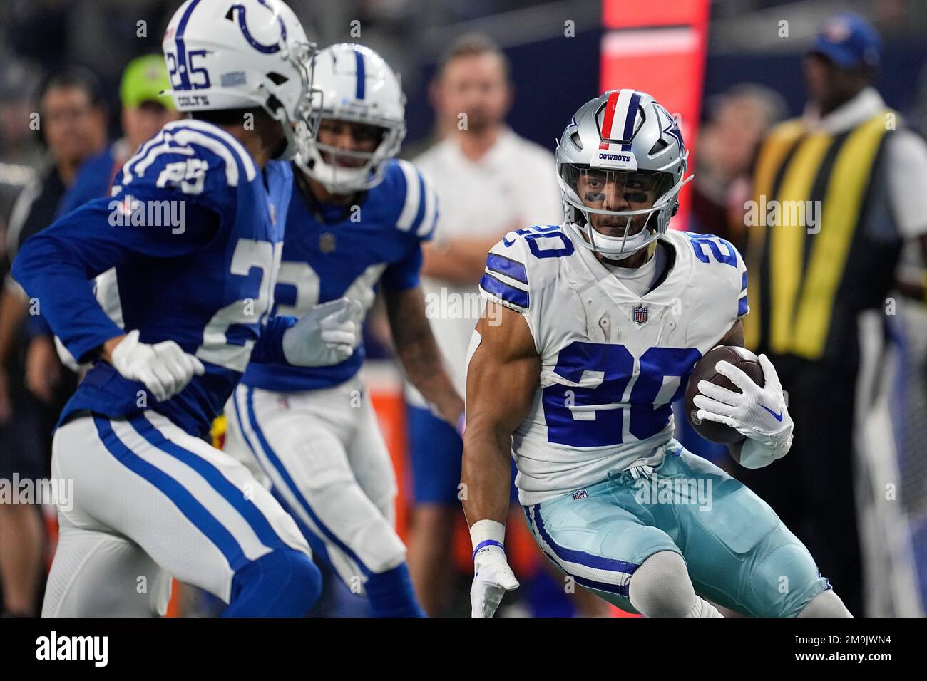 Dallas Cowboys' Tony Pollard (20) runs during the second half of an NFL ...